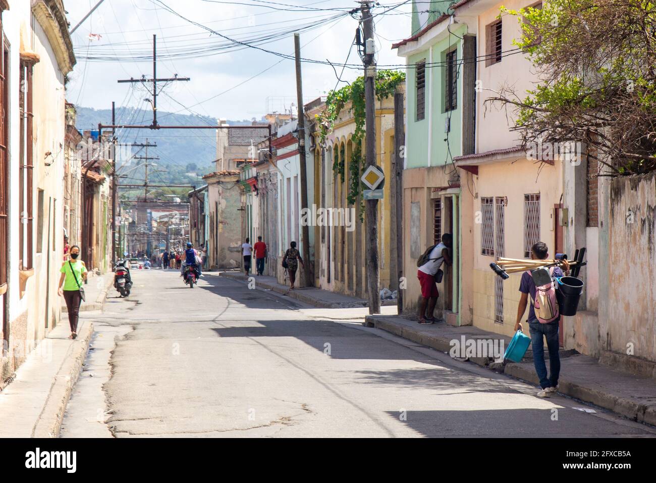 Lifestyle of Cuban people on a city street in Santiago de Cuba, Cuba. A ...