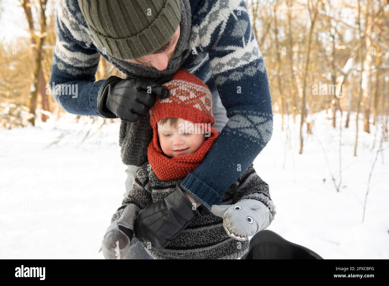 Child adjusting hat hi-res stock photography and images - Alamy