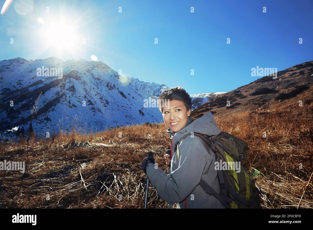 Woman looking over mountain hi-res stock photography and images - Alamy