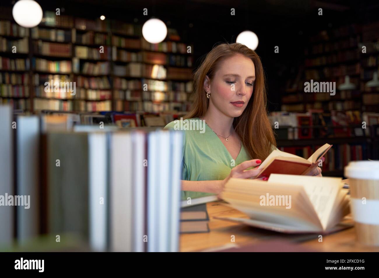 Woman reading group hi-res stock photography and images - Alamy