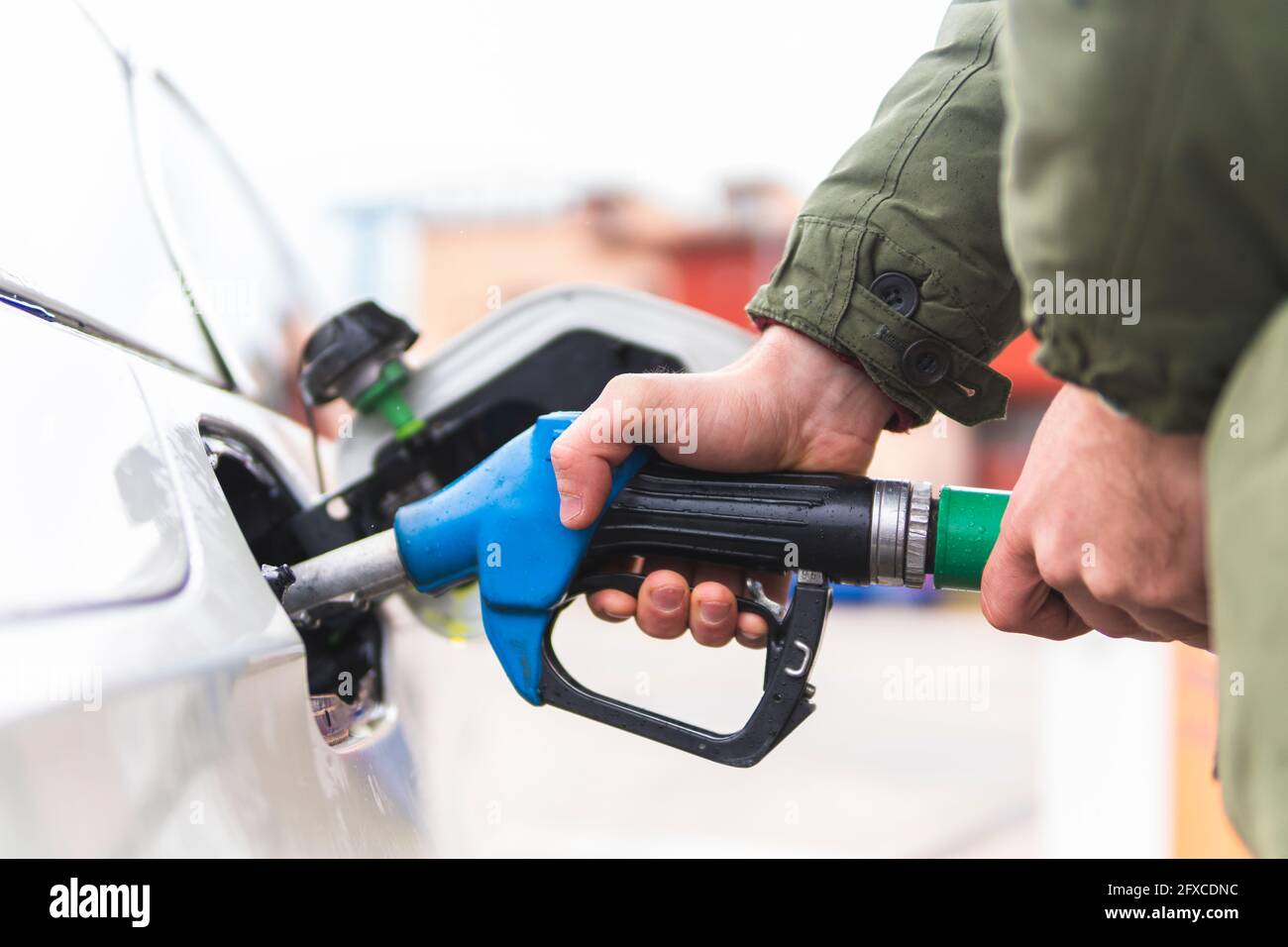 Person filling car with gas hi-res stock photography and images - Alamy