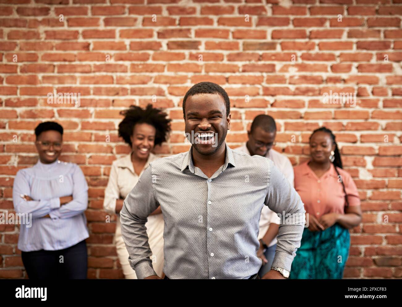 Coworkers laughing hi-res stock photography and images - Alamy