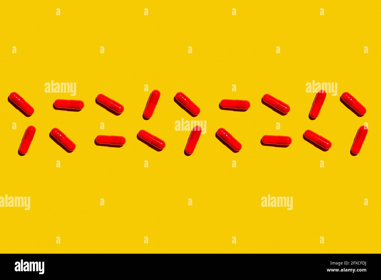 Yellow and red capsule hi-res stock photography and images - Alamy