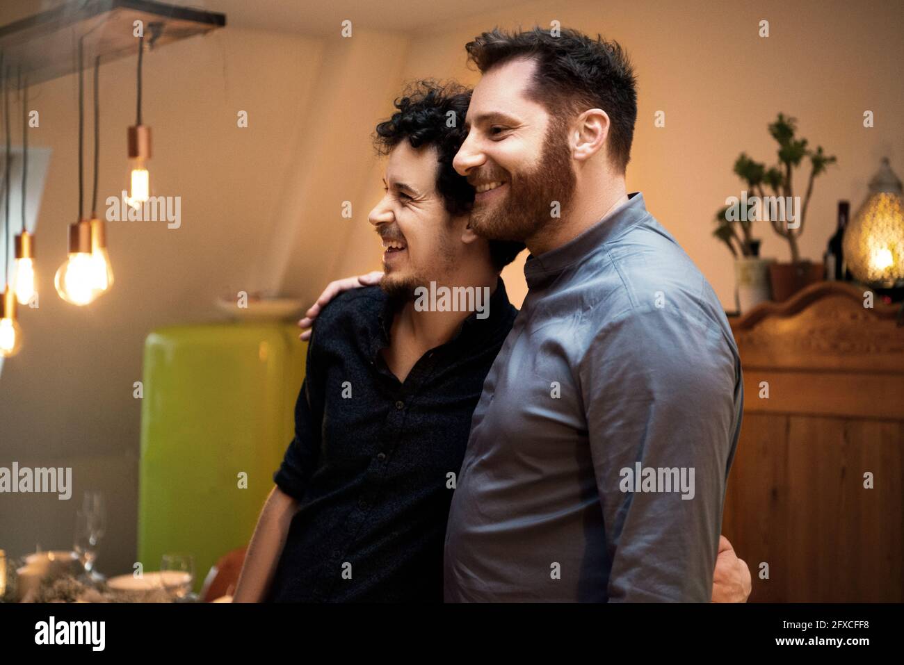 Happy male friends hi-res stock photography and images - Alamy