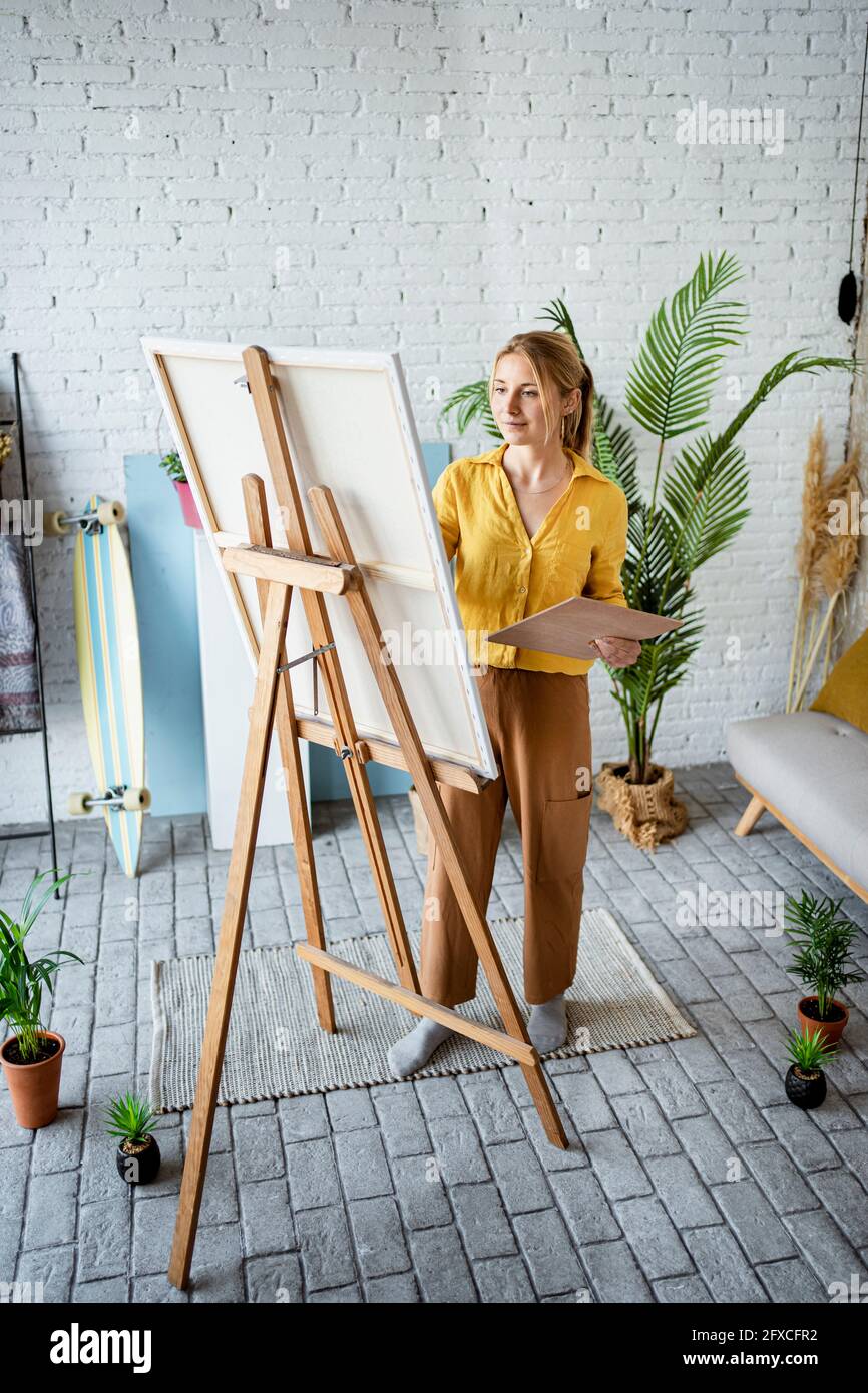Woman standing tree painting hi-res stock photography and images - Alamy