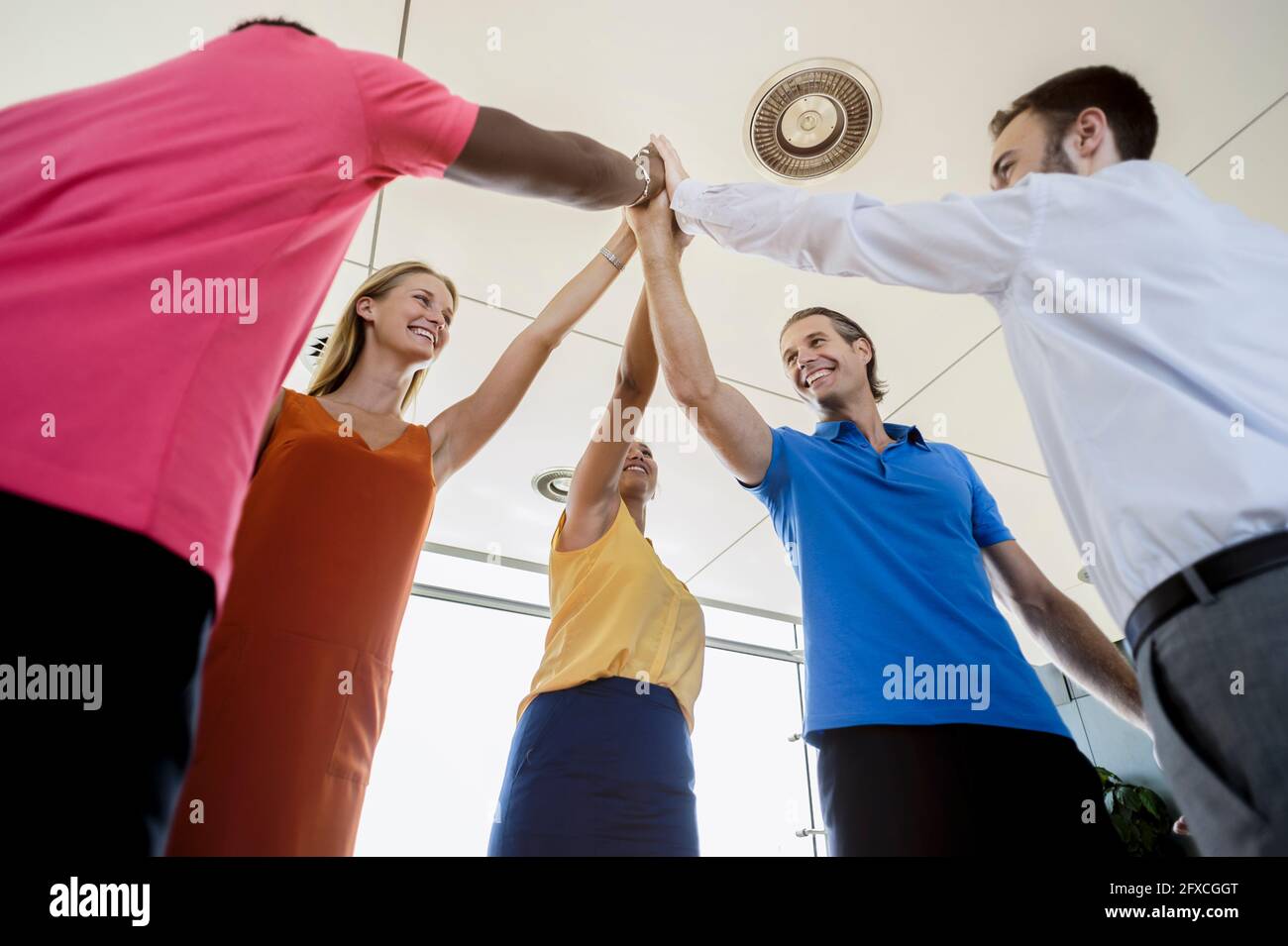 Team high five hi-res stock photography and images - Alamy