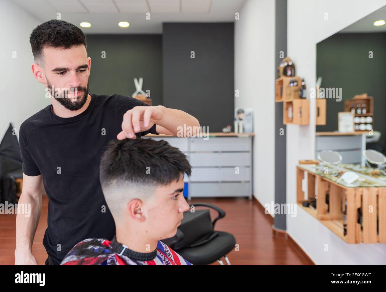 Teenager barber hi-res stock photography and images - Alamy