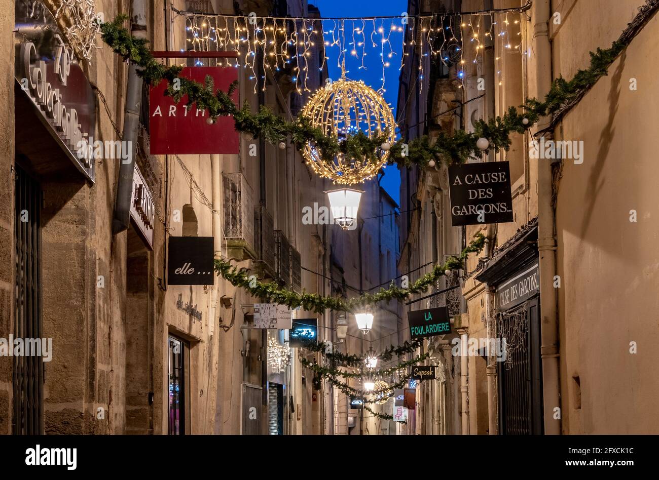 Traditional narrow street in a an old European town at night with ...