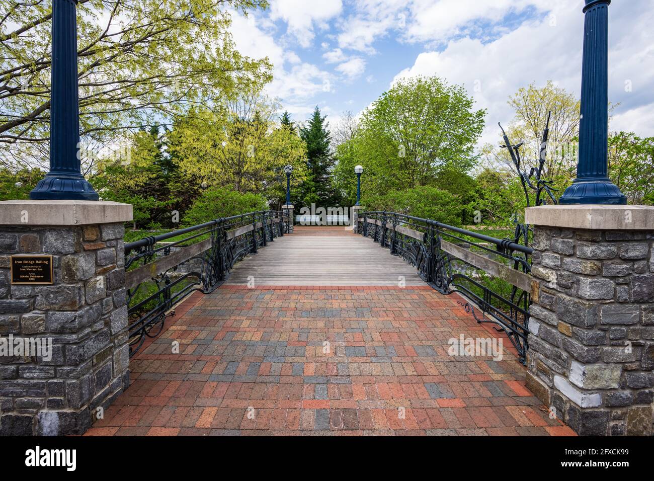 Frederick, MD - April 19, 2021: The Iron Bridge in Carroll Creek Park ...