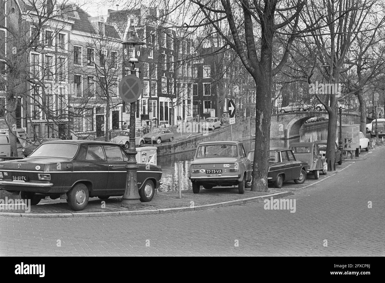 Car parked on sidewalk Black and White Stock Photos & Images - Alamy