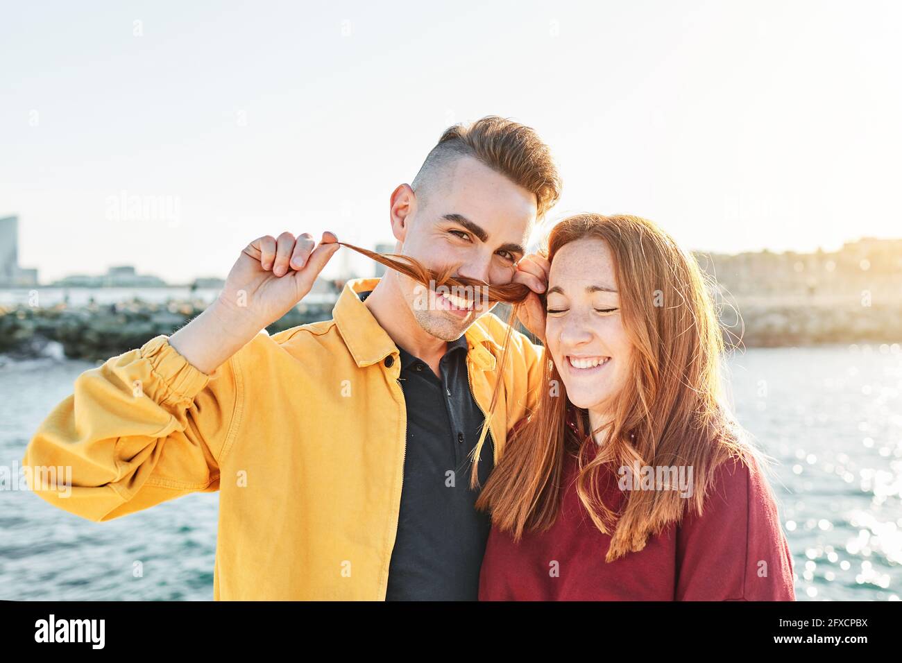 Laughing at the beach hi-res stock photography and images - Alamy