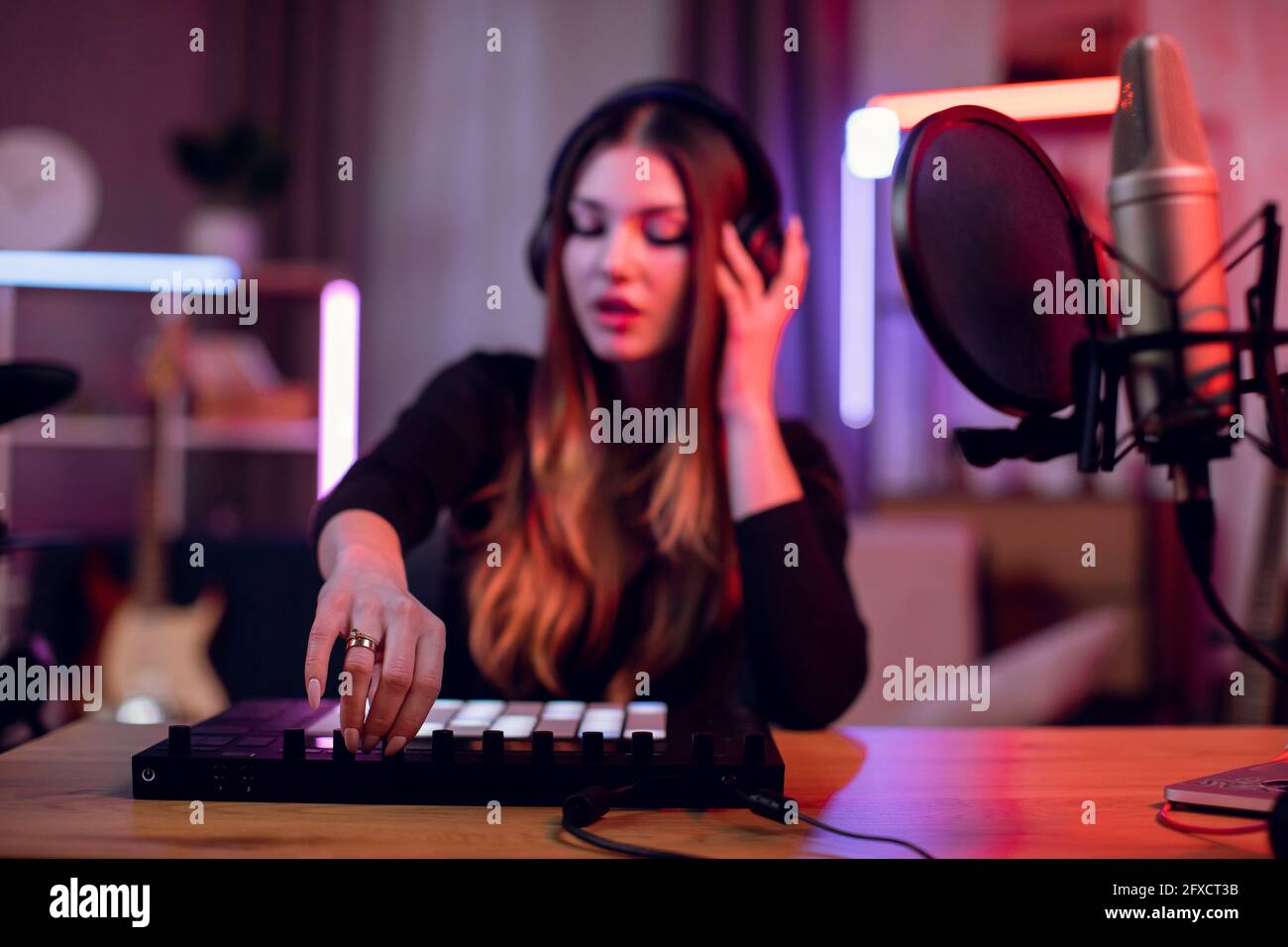 Young woman playing recorder hi-res stock photography and images - Alamy