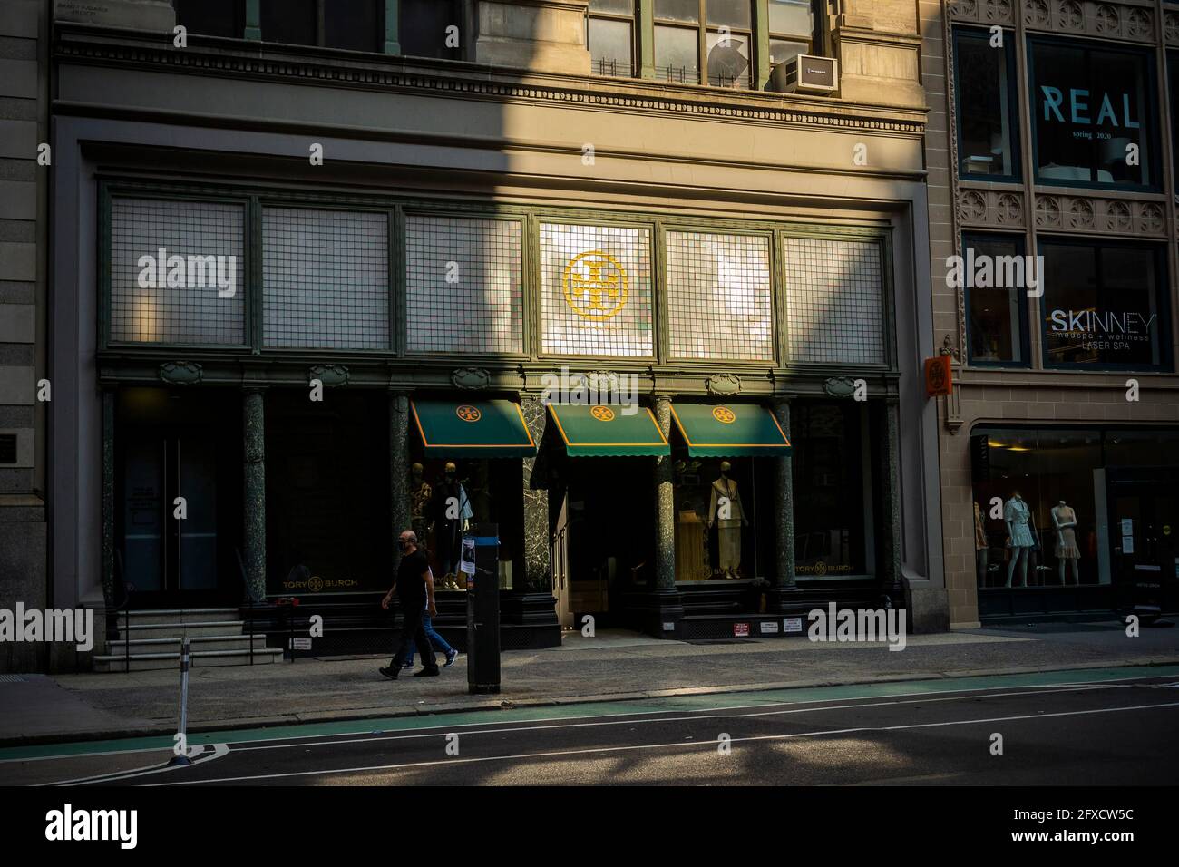 Storefronts, including Tory Burch, in the Flatiron neighborhood in New ...