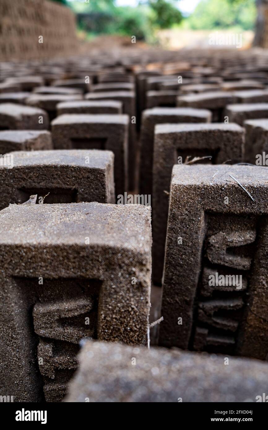 Men making clay bricks by hand in a rural village in Nayagarh, Odisha ...
