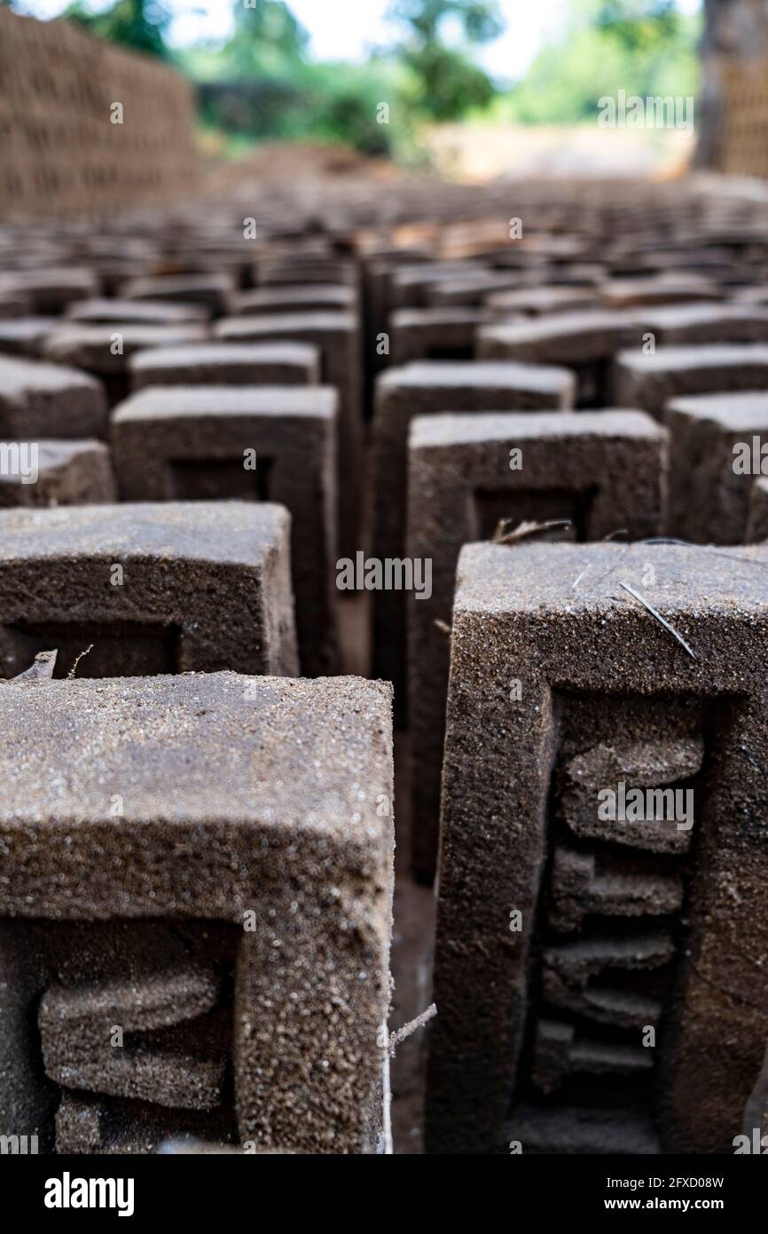 Men making clay bricks by hand in a rural village in Nayagarh, Odisha ...