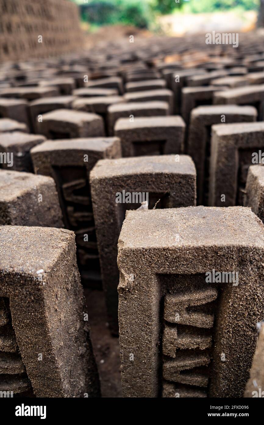 Men making clay bricks by hand in a rural village in Nayagarh, Odisha ...