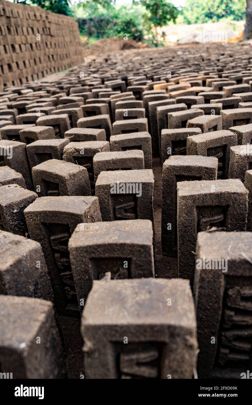 Men making clay bricks by hand in a rural village in Nayagarh, Odisha ...
