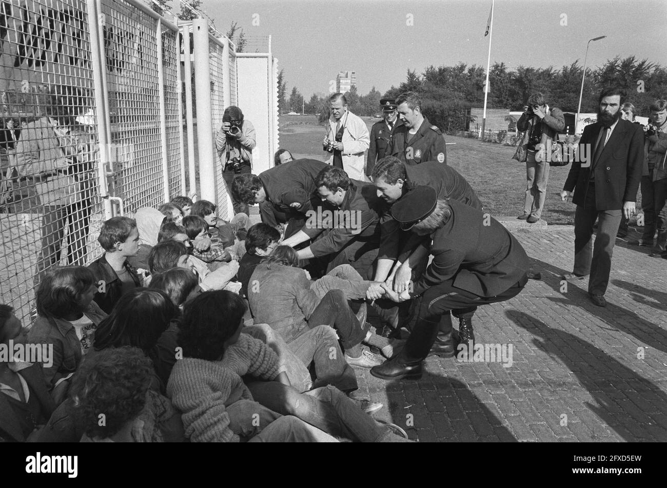 Human barricade formed hi-res stock photography and images - Alamy