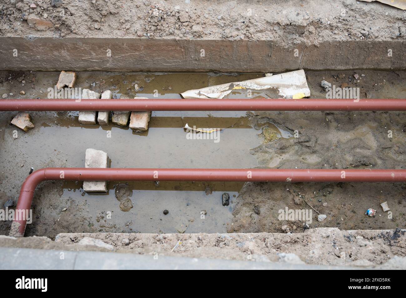 They laid new pipes underground Stock Photo - Alamy