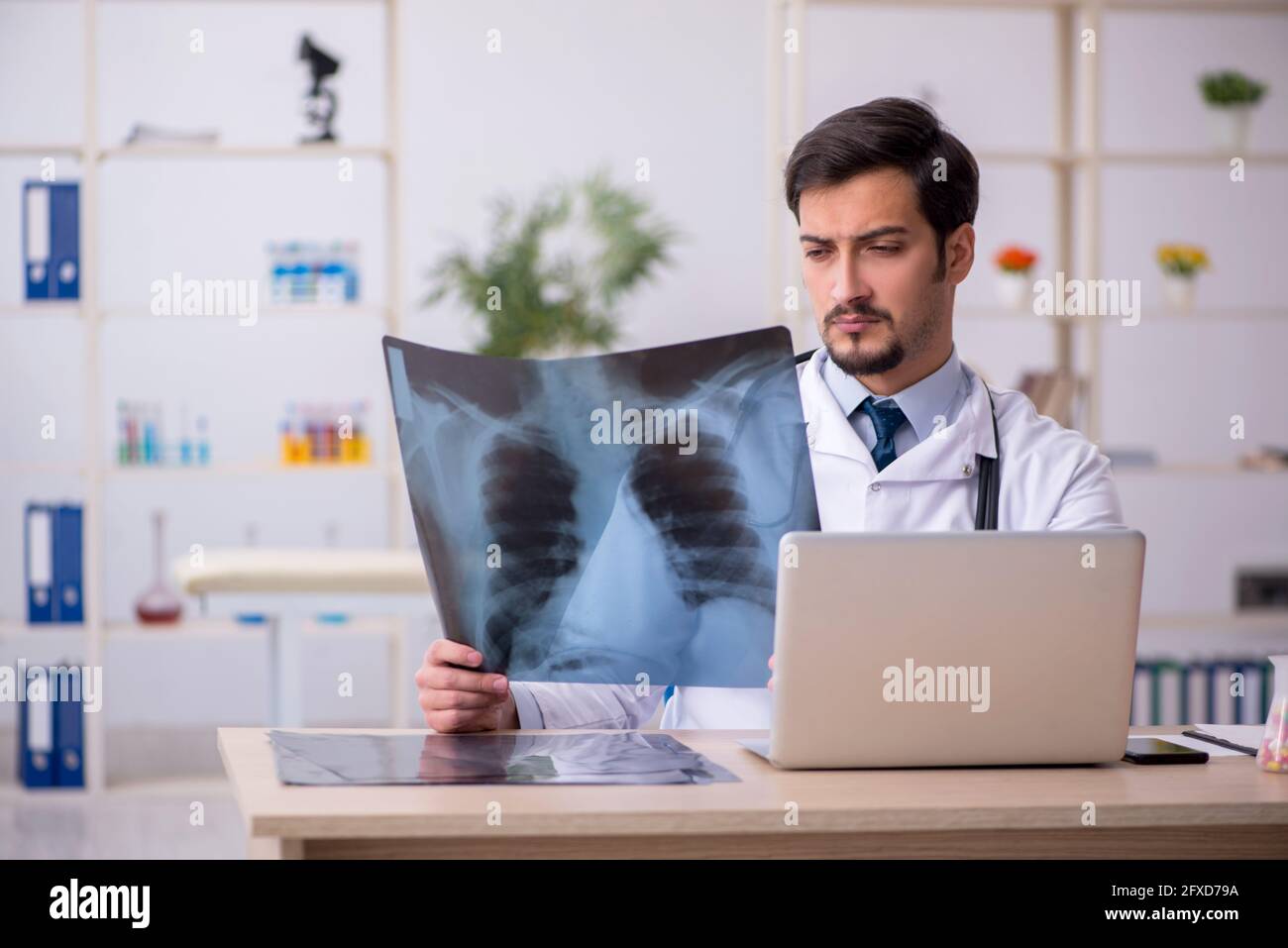 Young doctor radiologist working at the hospital Stock Photo - Alamy