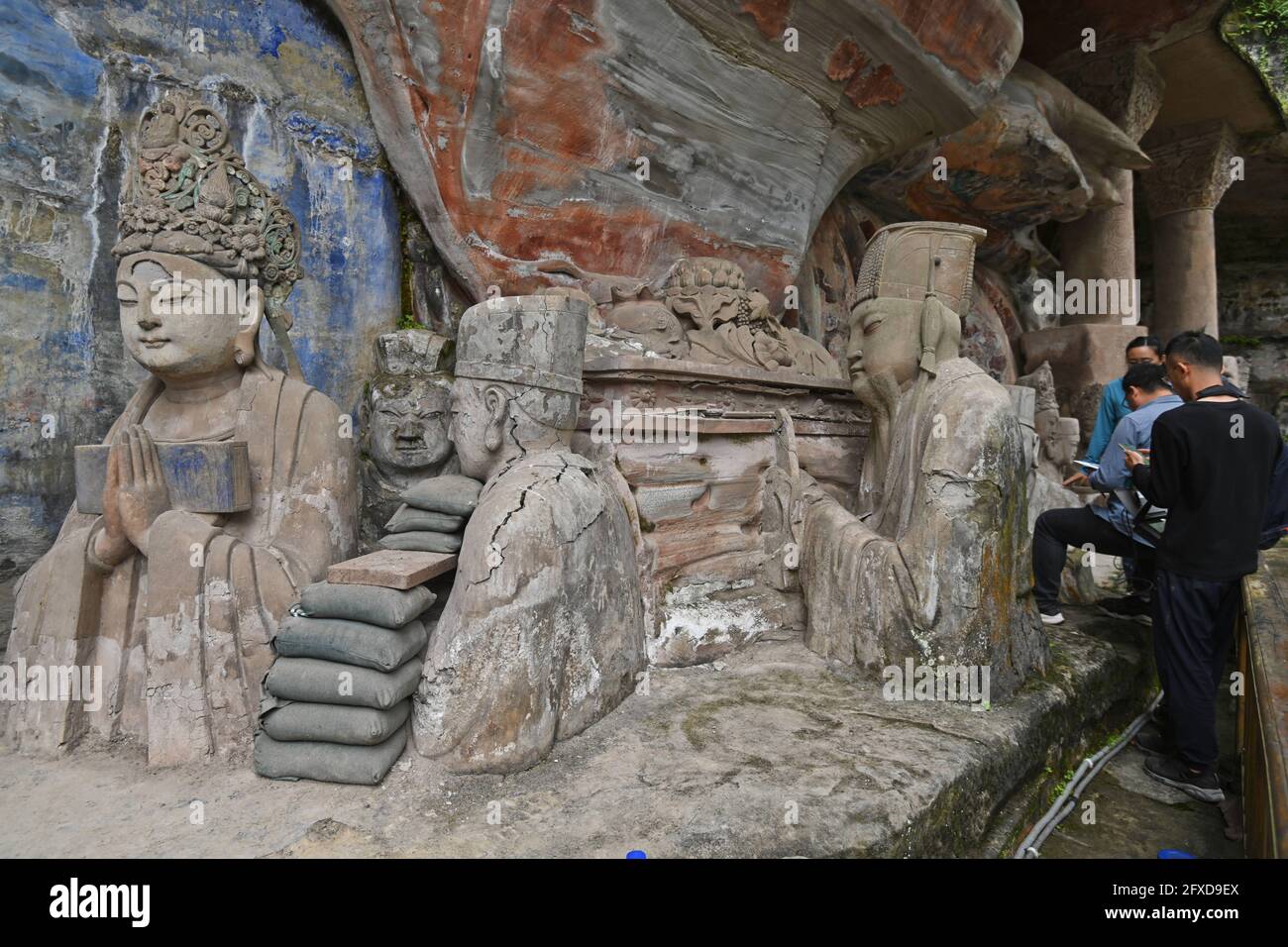 CHONGQING, CHINA - MAY 26, 2021 - Restoration workers monitor the ...