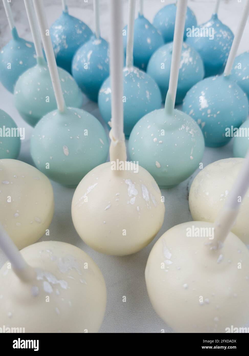 Bunch of standing round shape white and blue chocolate cakepops Stock ...