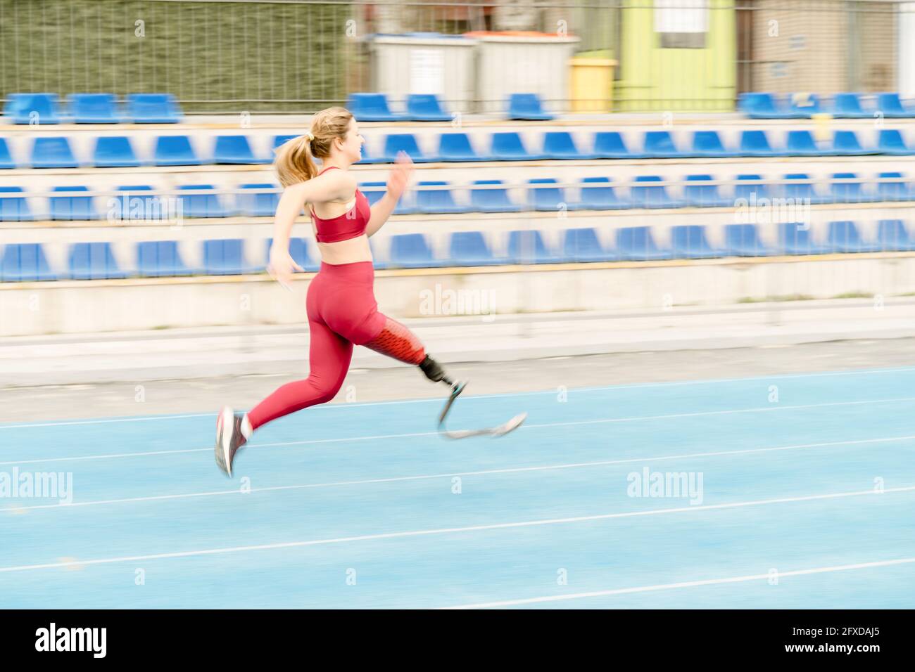 Female athlete with prosthetic leg running Stock Photo - Alamy