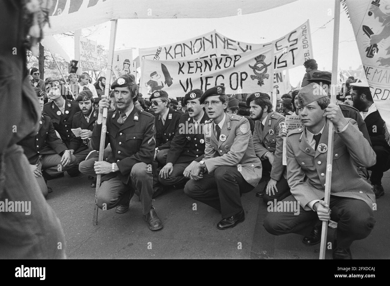 Soldiers in uniform with banner Nuclear warhead fly away, October 29 ...