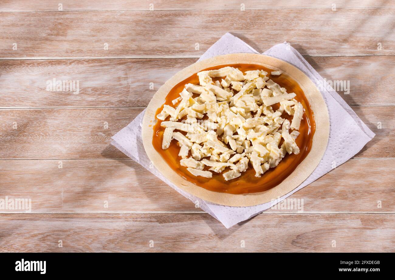 Wafers with caramel sauce and cheese - Traditional Colombian dessert ...