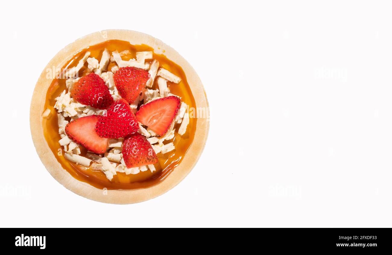 Traditional Colombian dessert - Wafers with fruit, cheese and caramel ...