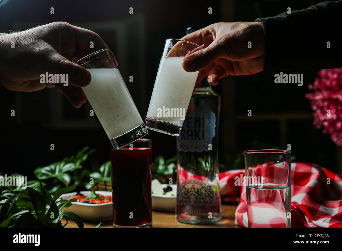National Turkish alcoholic drink Raki and appetiser on table Stock ...