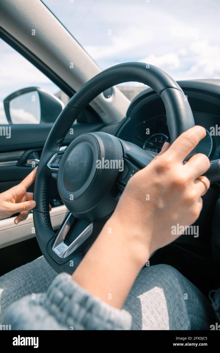 woman driving car view from inside no face road trip Stock Photo - Alamy