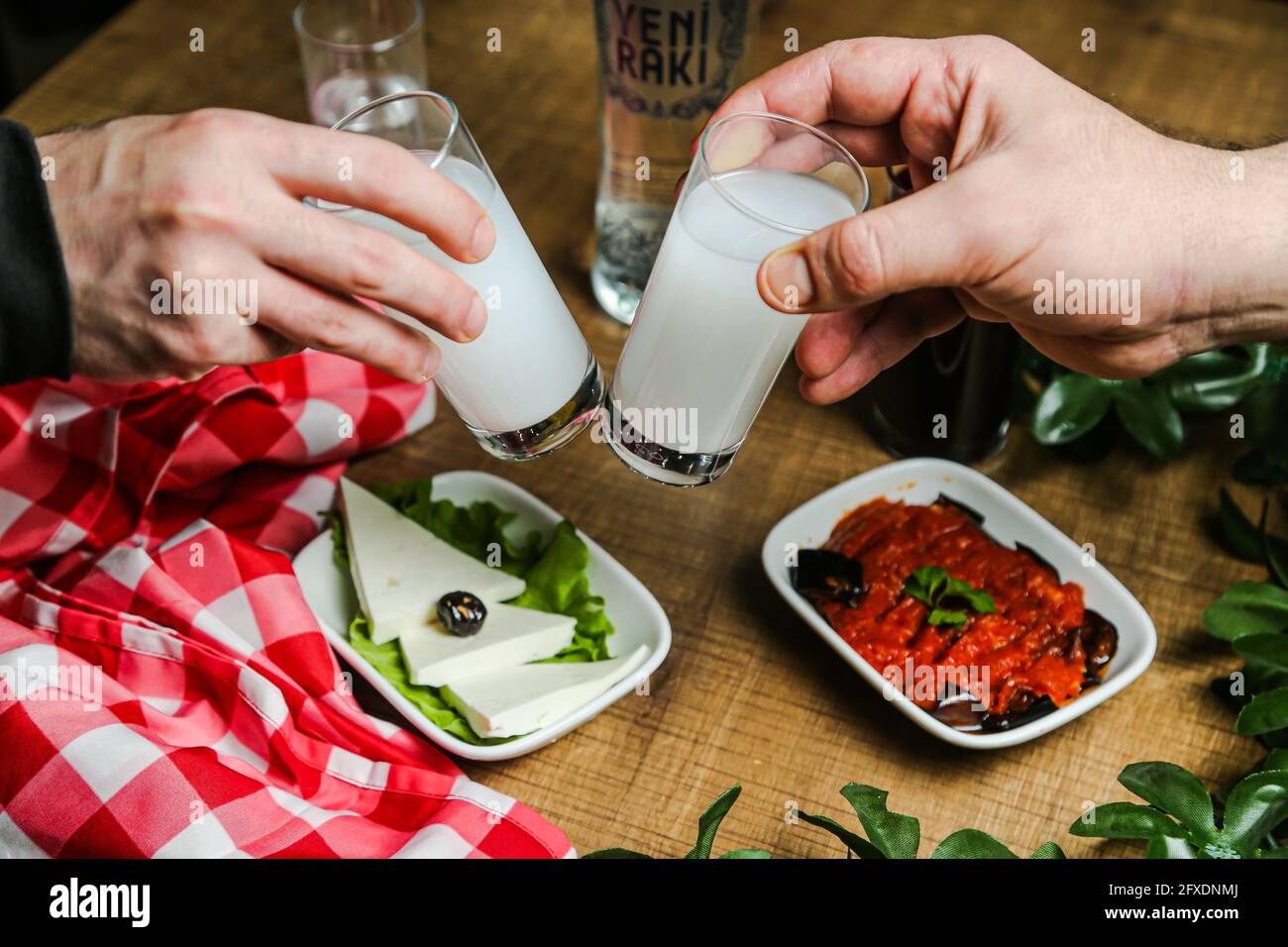 National Turkish alcoholic drink Raki and appetiser on table Stock ...