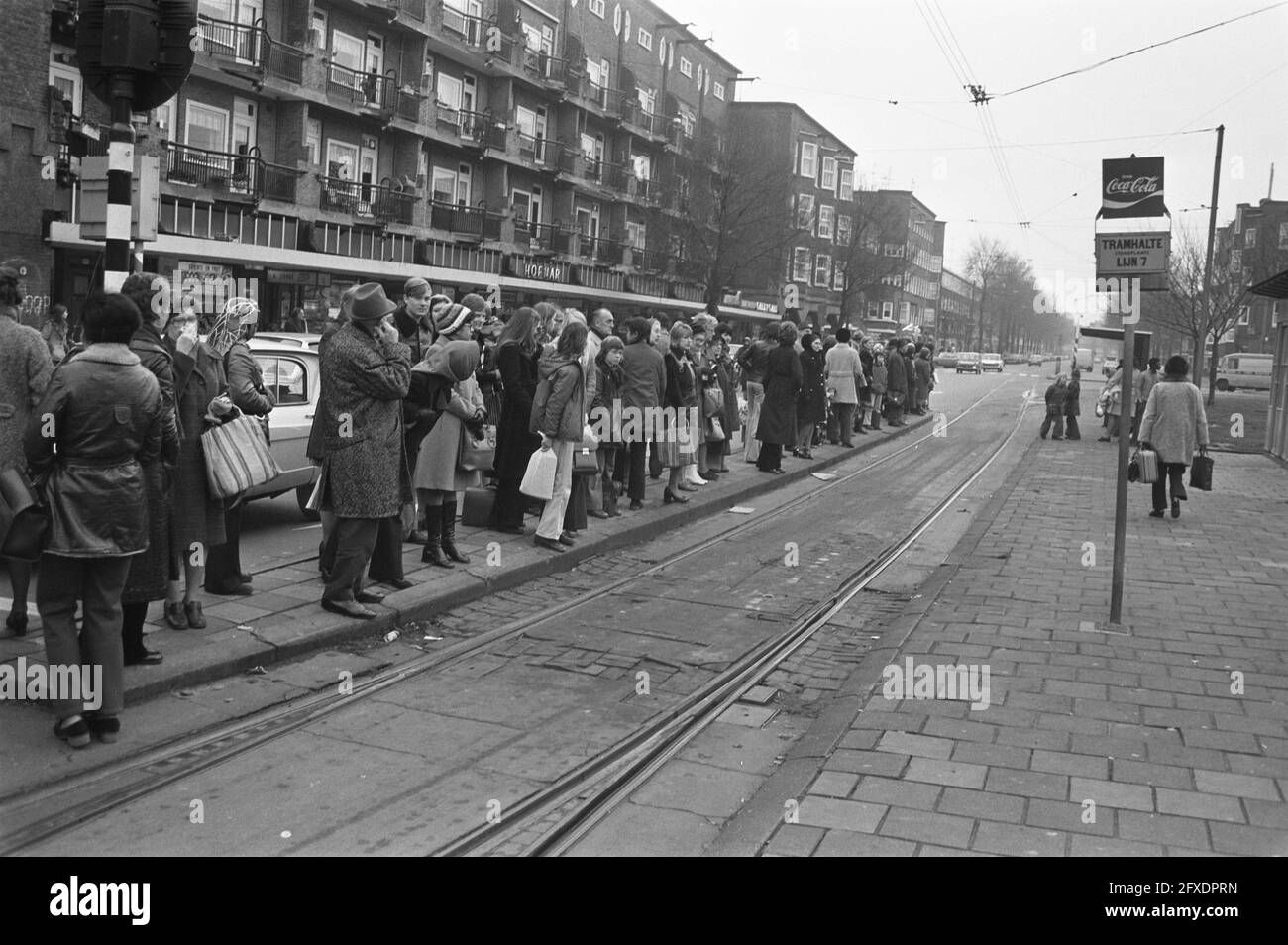 Overcrowded streetcar stop hi-res stock photography and images - Alamy