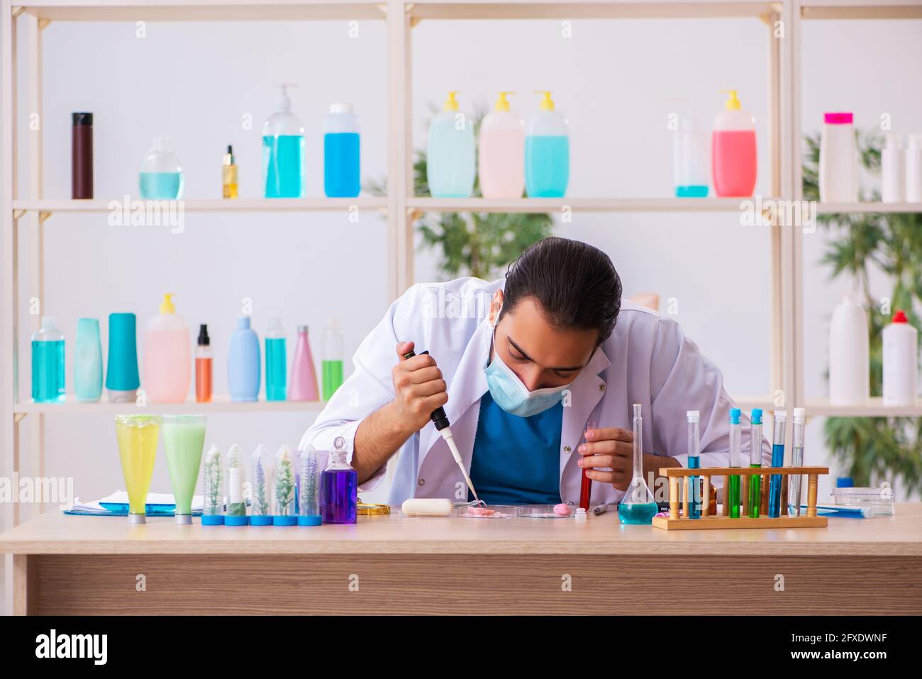 Young chemist testing soap in the lab Stock Photo - Alamy