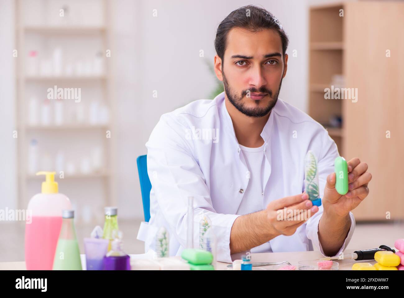 Young chemist testing soap in the lab Stock Photo - Alamy