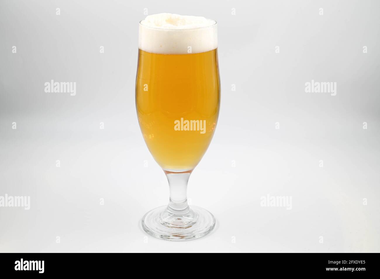 Glass of light beer isolated on a white background Stock Photo - Alamy