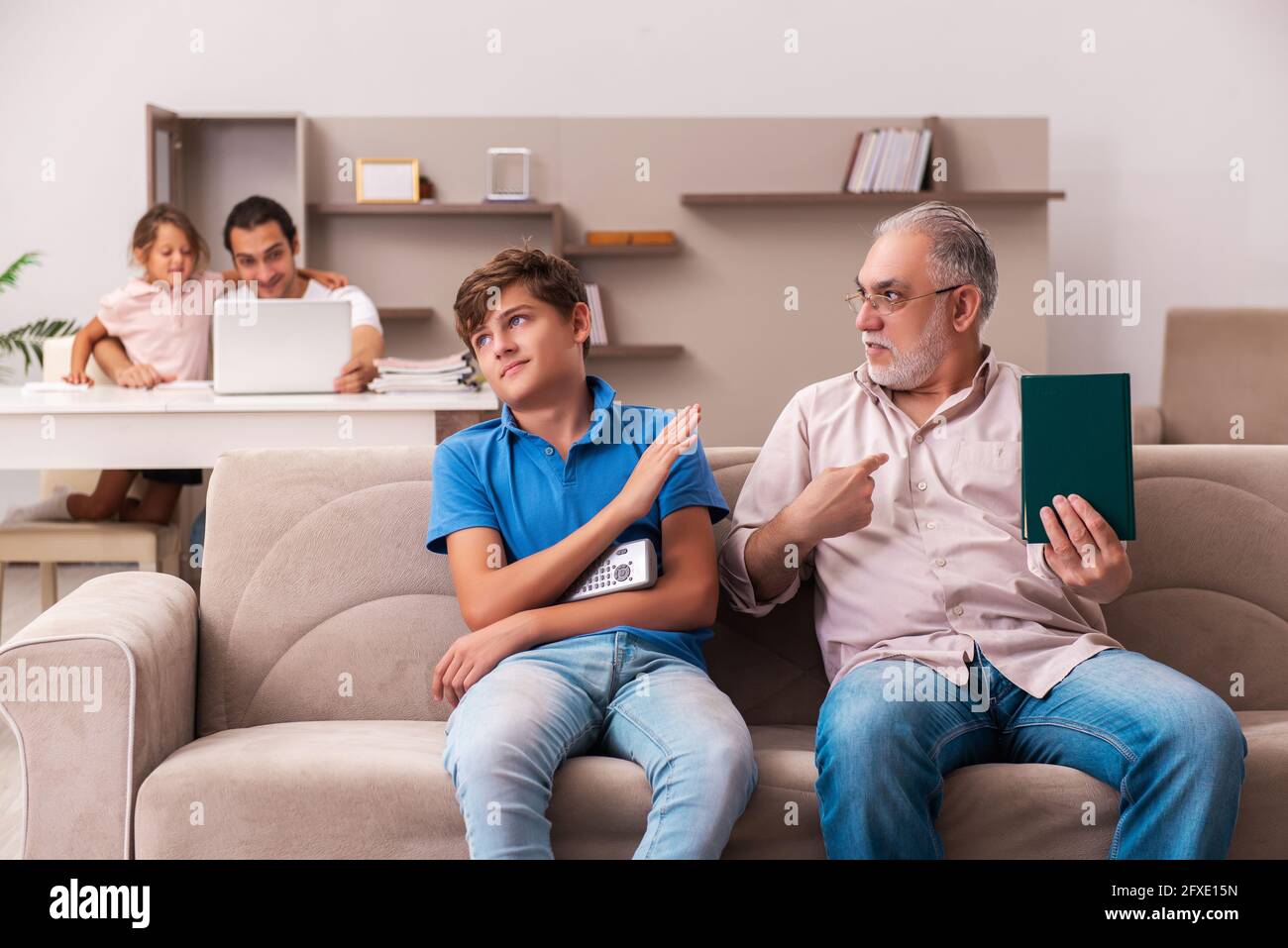 Three generations at home in early development concept Stock Photo - Alamy