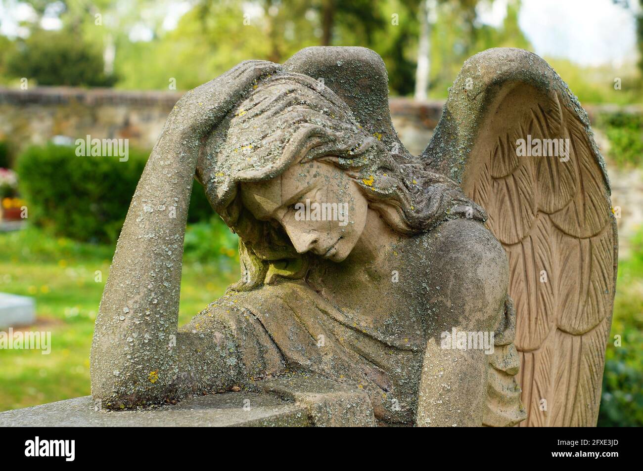 FRANKFURT, GERMANY - May 05, 2021: Sculpture of a mourning angel on a ...