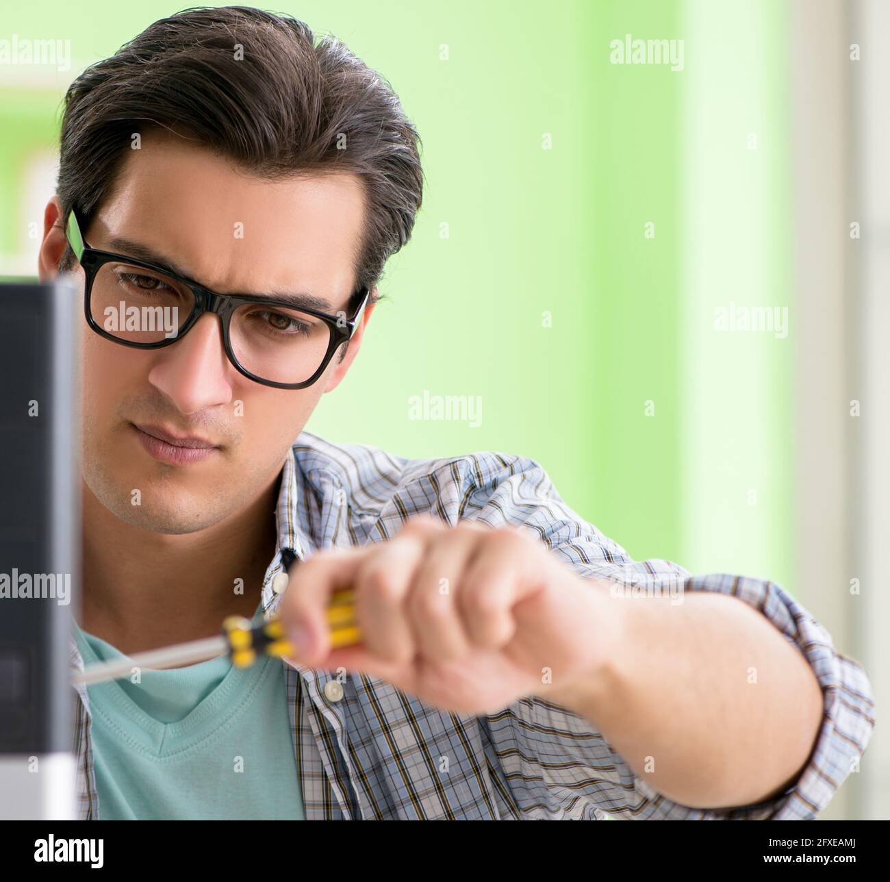 The computer engineer repairing broken desktop Stock Photo - Alamy