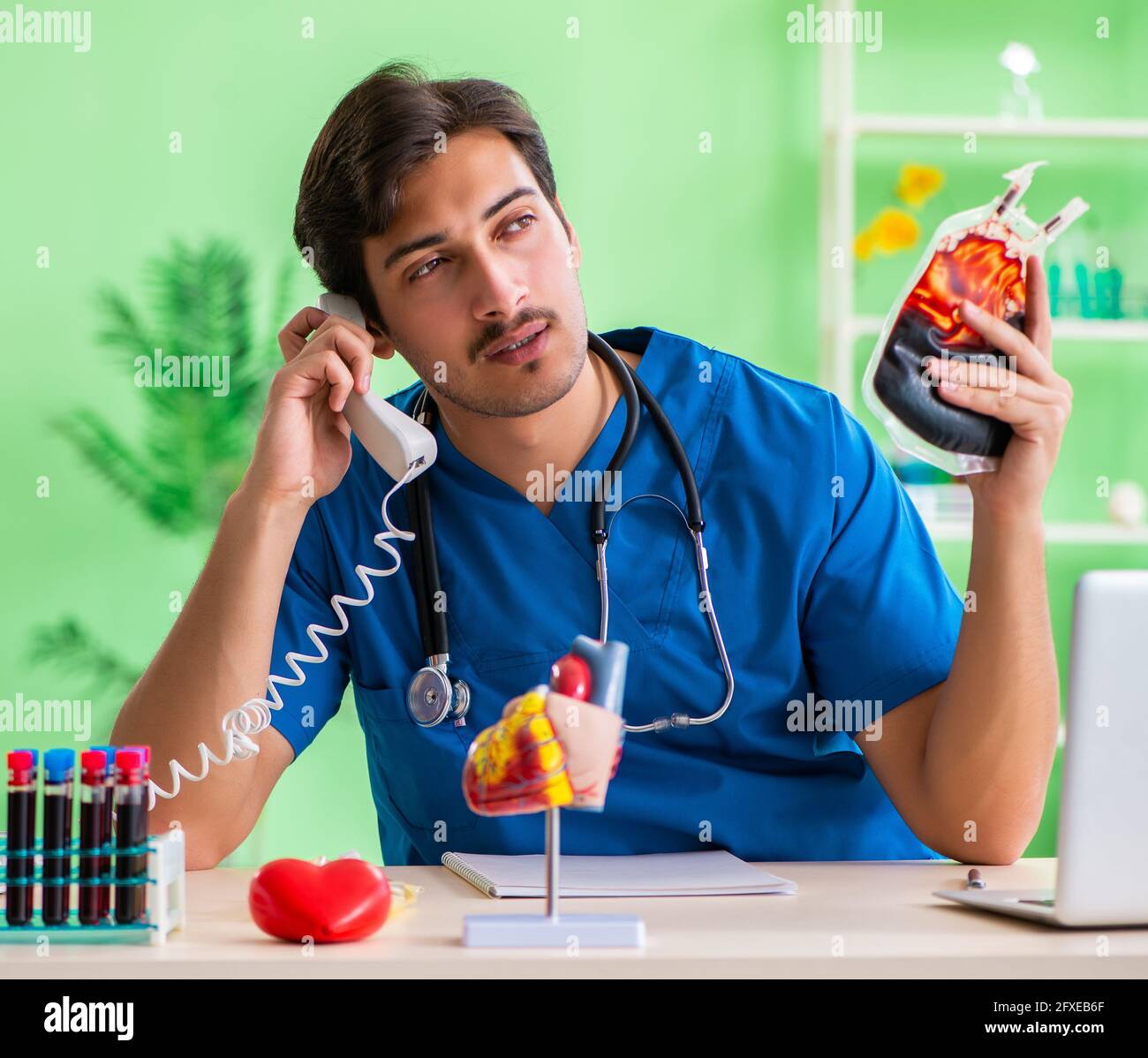 The doctor doing blood analysis in the lab Stock Photo - Alamy