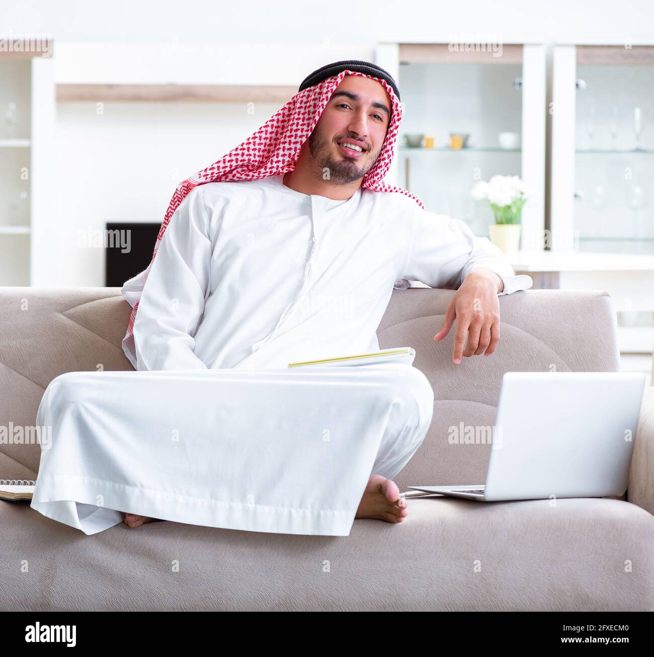The arab man working at home on his work Stock Photo - Alamy