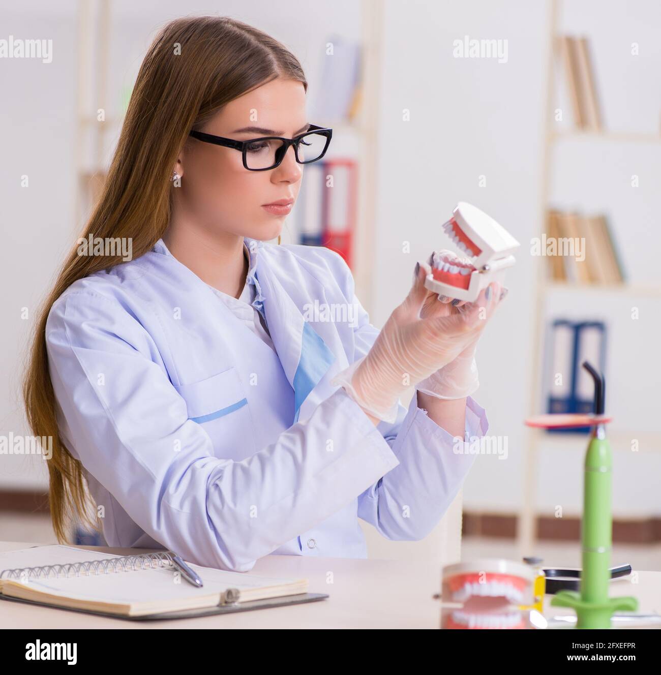 The dentistry student practicing skills in classroom Stock Photo - Alamy