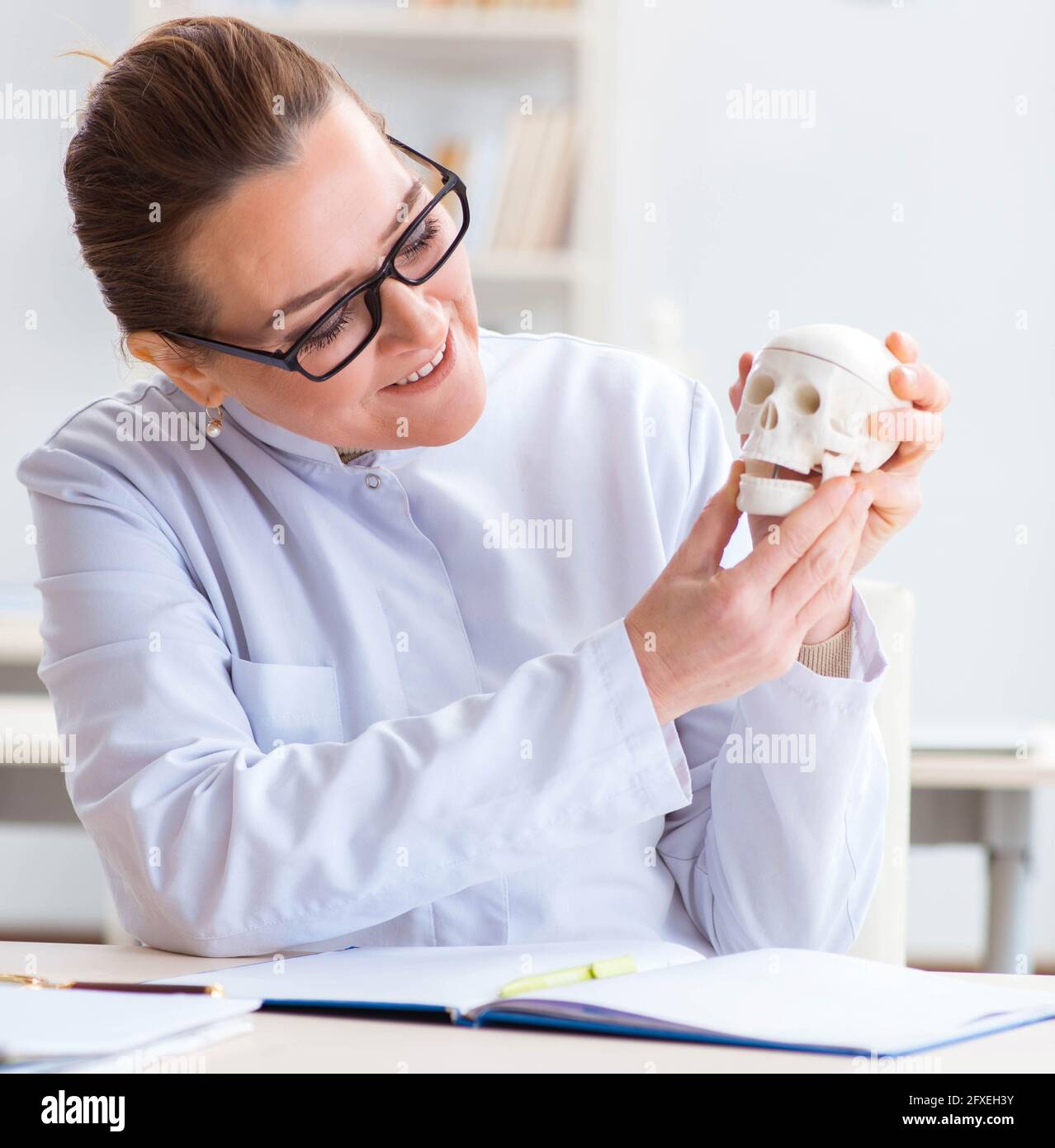 The woman doctor studying human skeleton Stock Photo - Alamy