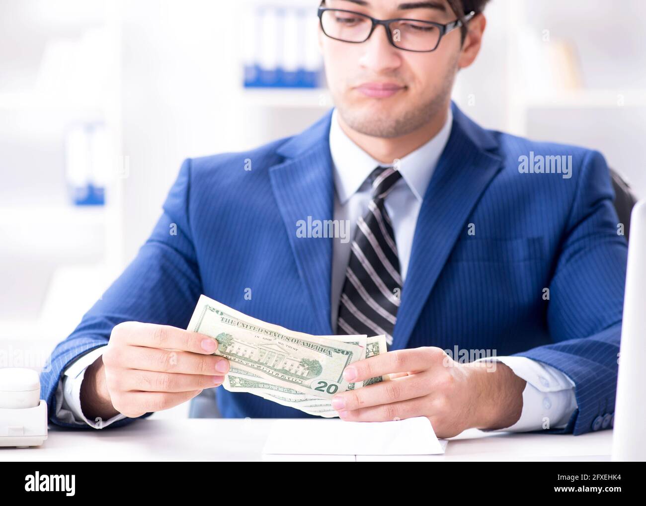 The businessman receiving his salary and bonus Stock Photo - Alamy