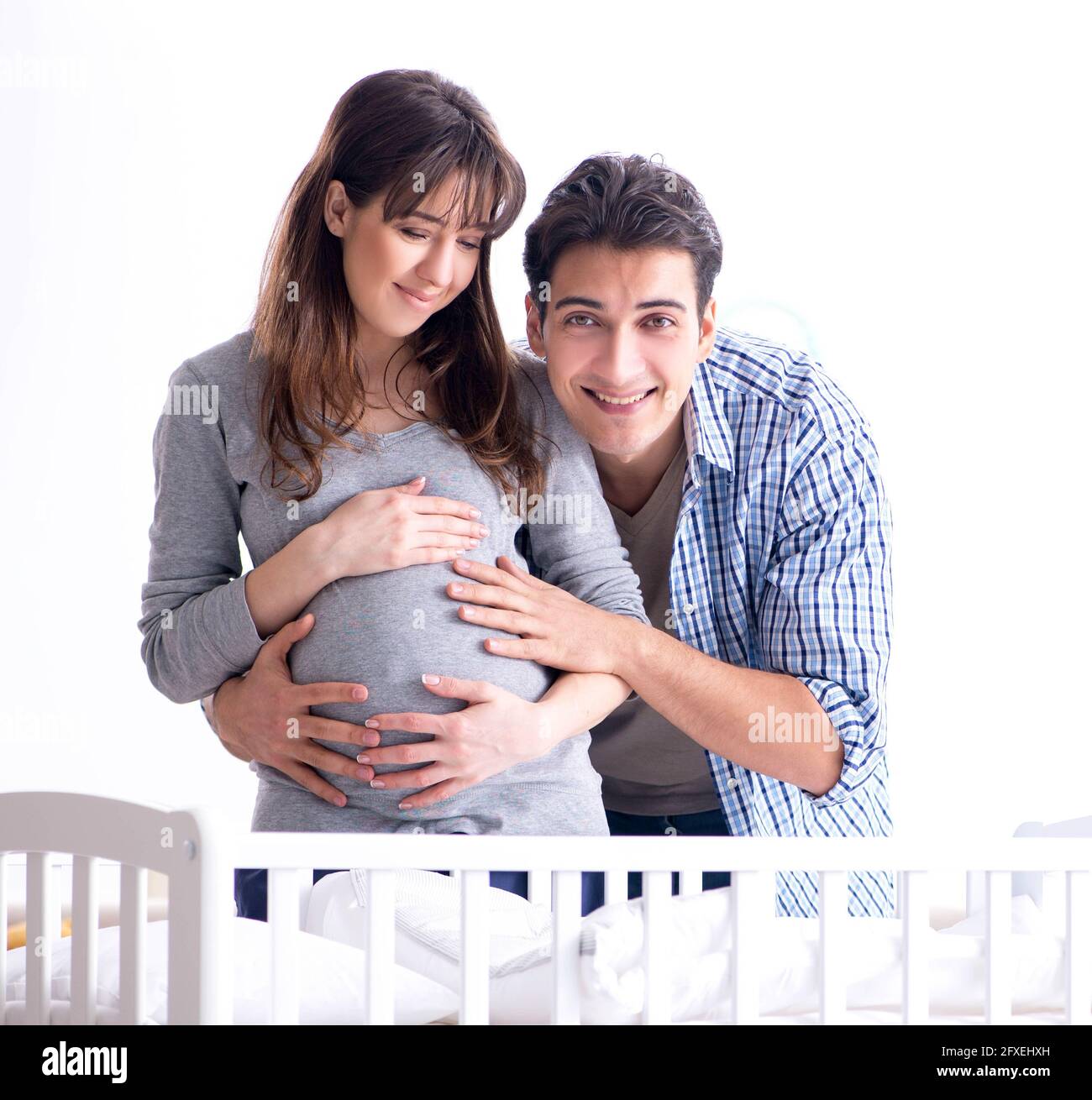The young parents expecting their first baby Stock Photo - Alamy