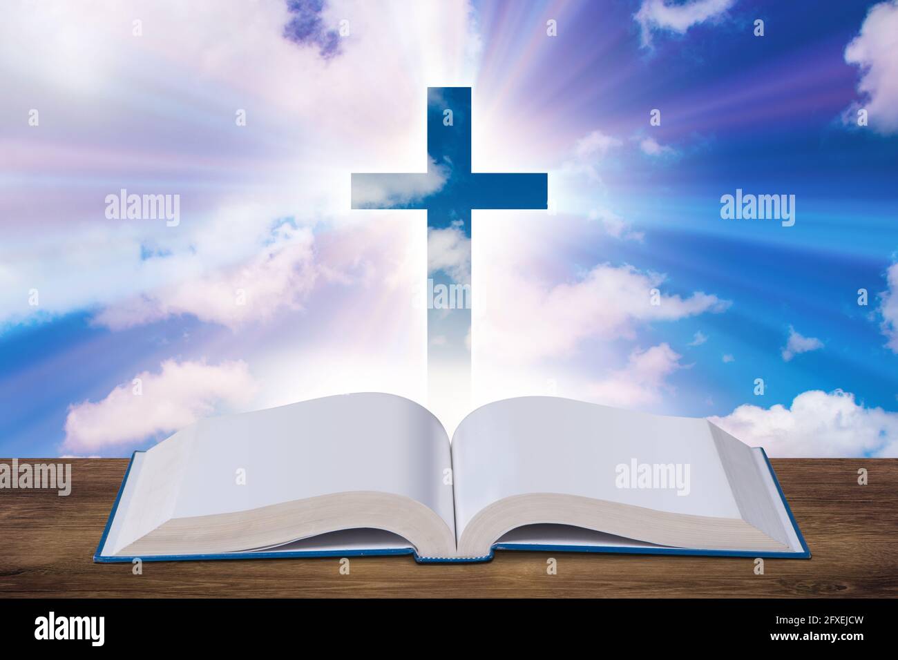 Religious concept with the cross and bible book Stock Photo - Alamy