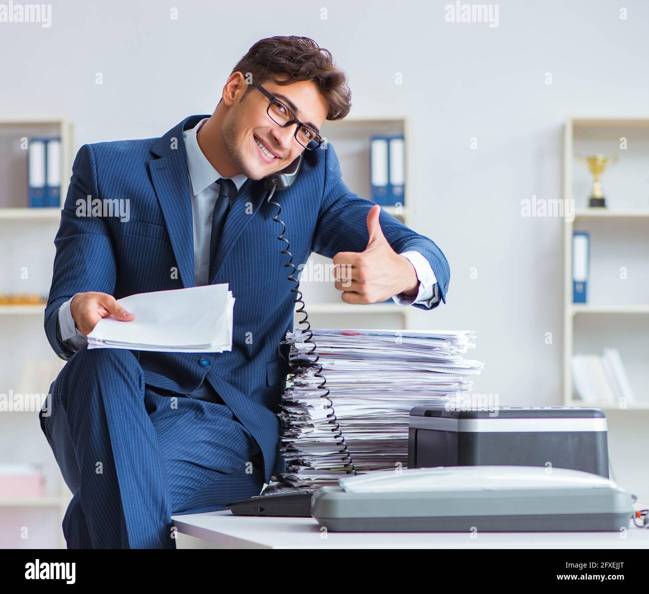 The businessman making copies in copying machine Stock Photo - Alamy