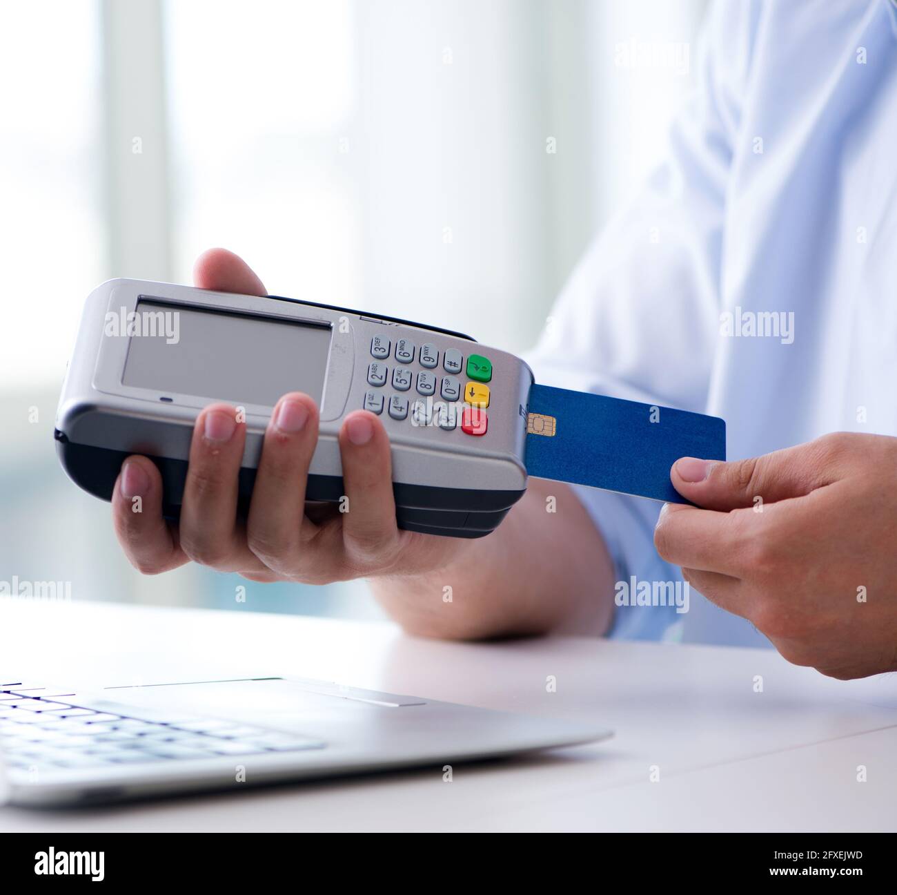 The man processing credit card transaction with pos terminal Stock ...