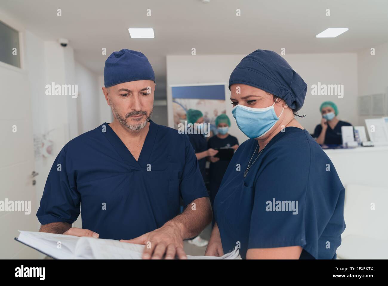 orthopedic doctor working together with his multiethnic team Stock ...